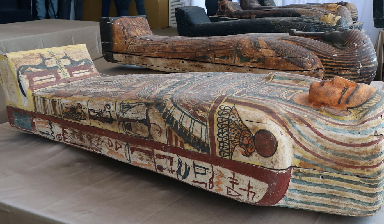 Egypt archaeologists discover 59 sealed coffins buried 2,500 years ago ...