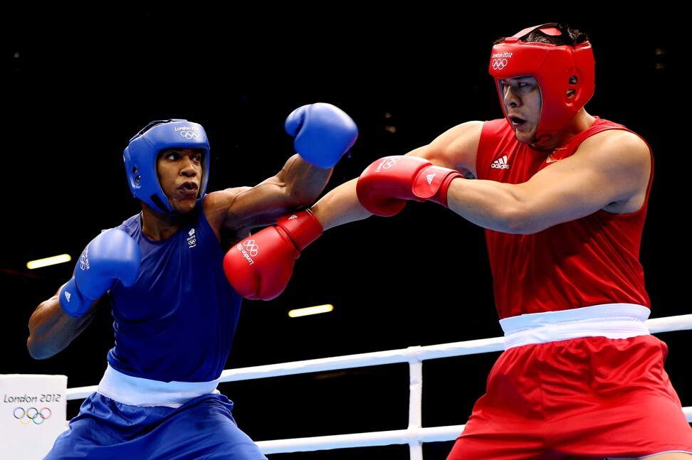 Chinese heavyweight Zhang aims for the top after impressive KO ...