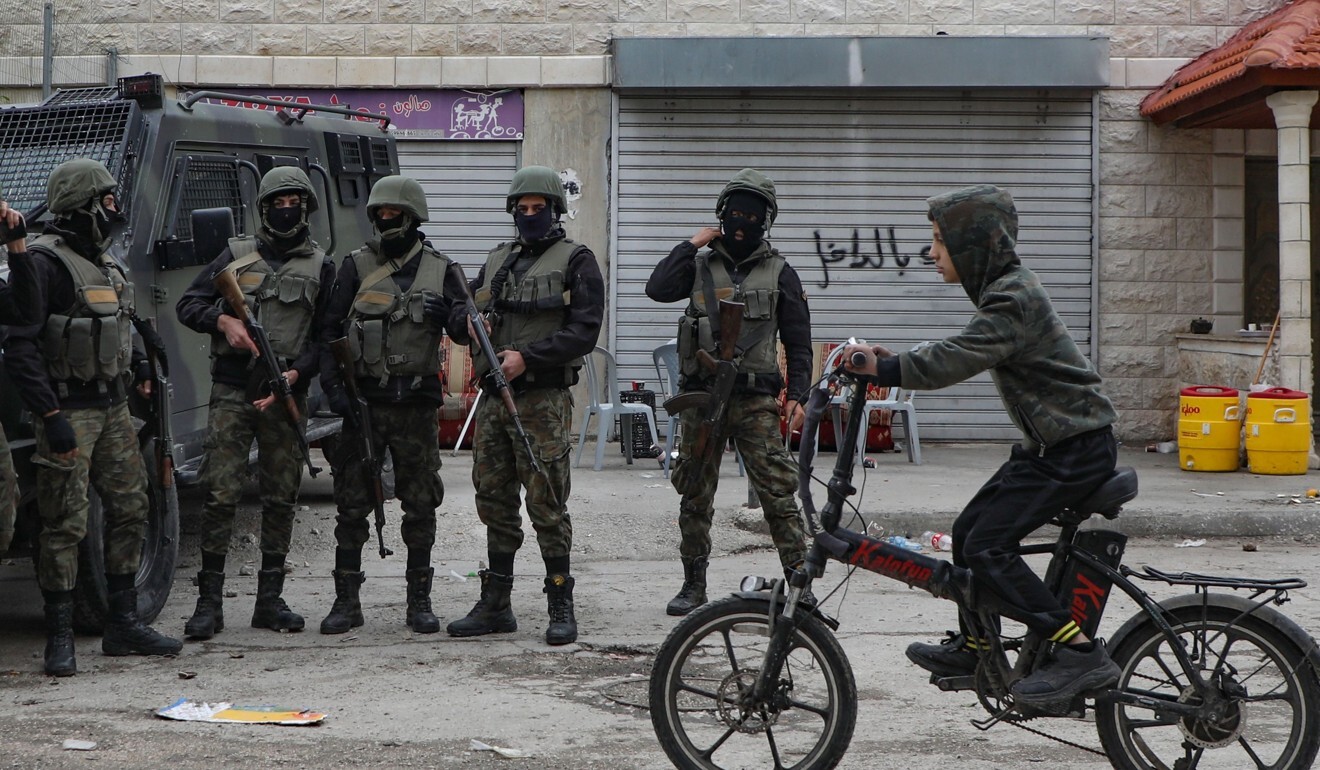 Palestinians in refugee camps prepare for post-Abbas power struggle ...