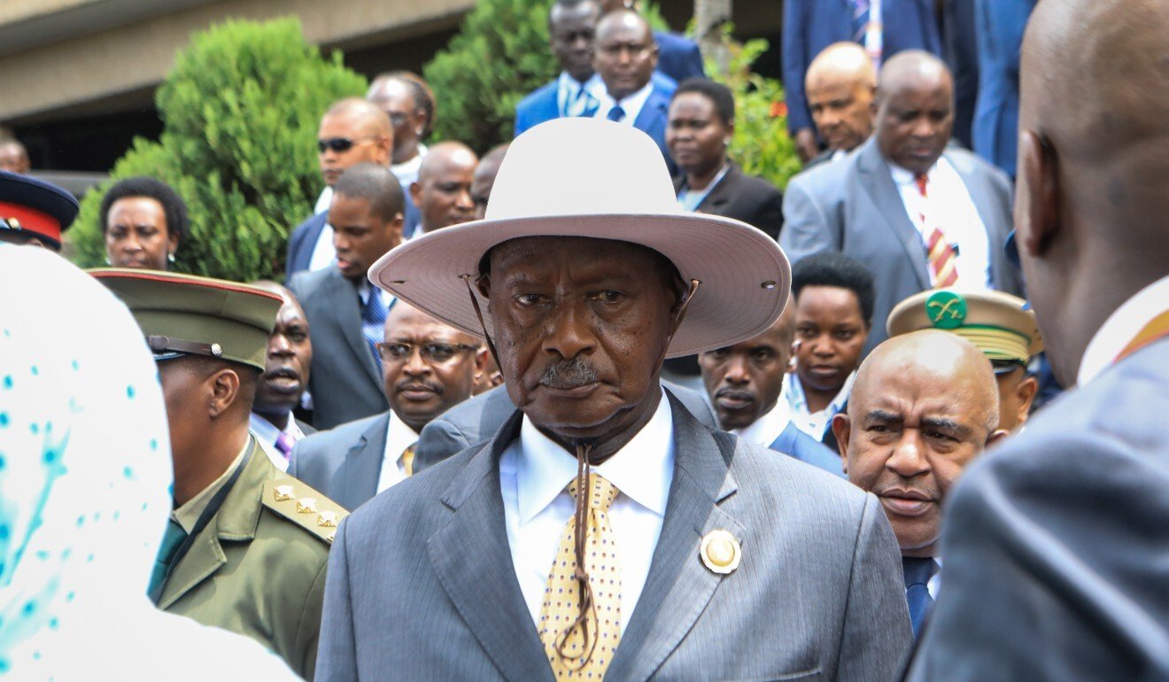 Ugandans vote in charged election between long-time leader Yoweri ...