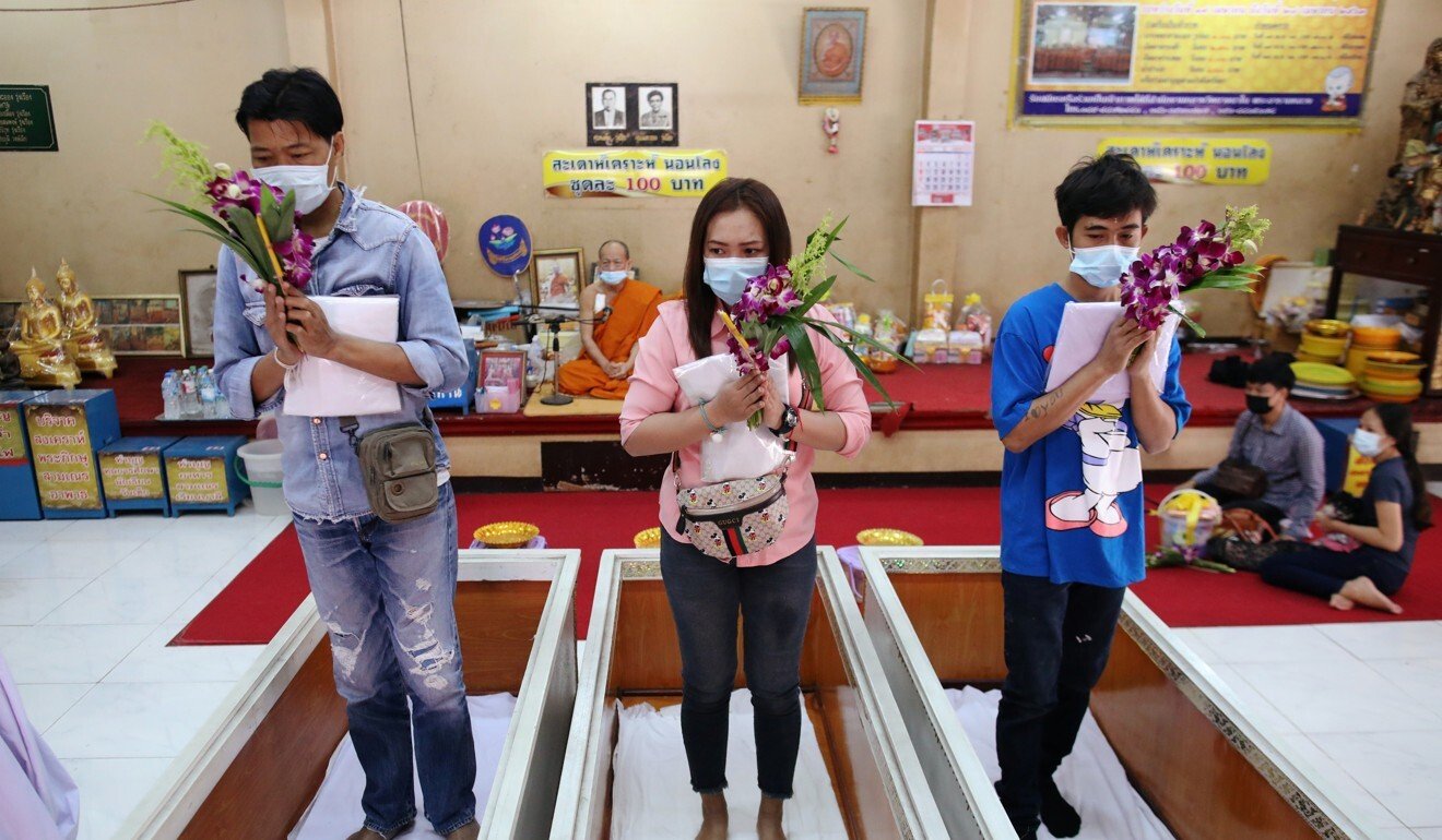 Mock funerals held in Thailand to ‘remember death’, restore fortunes ...