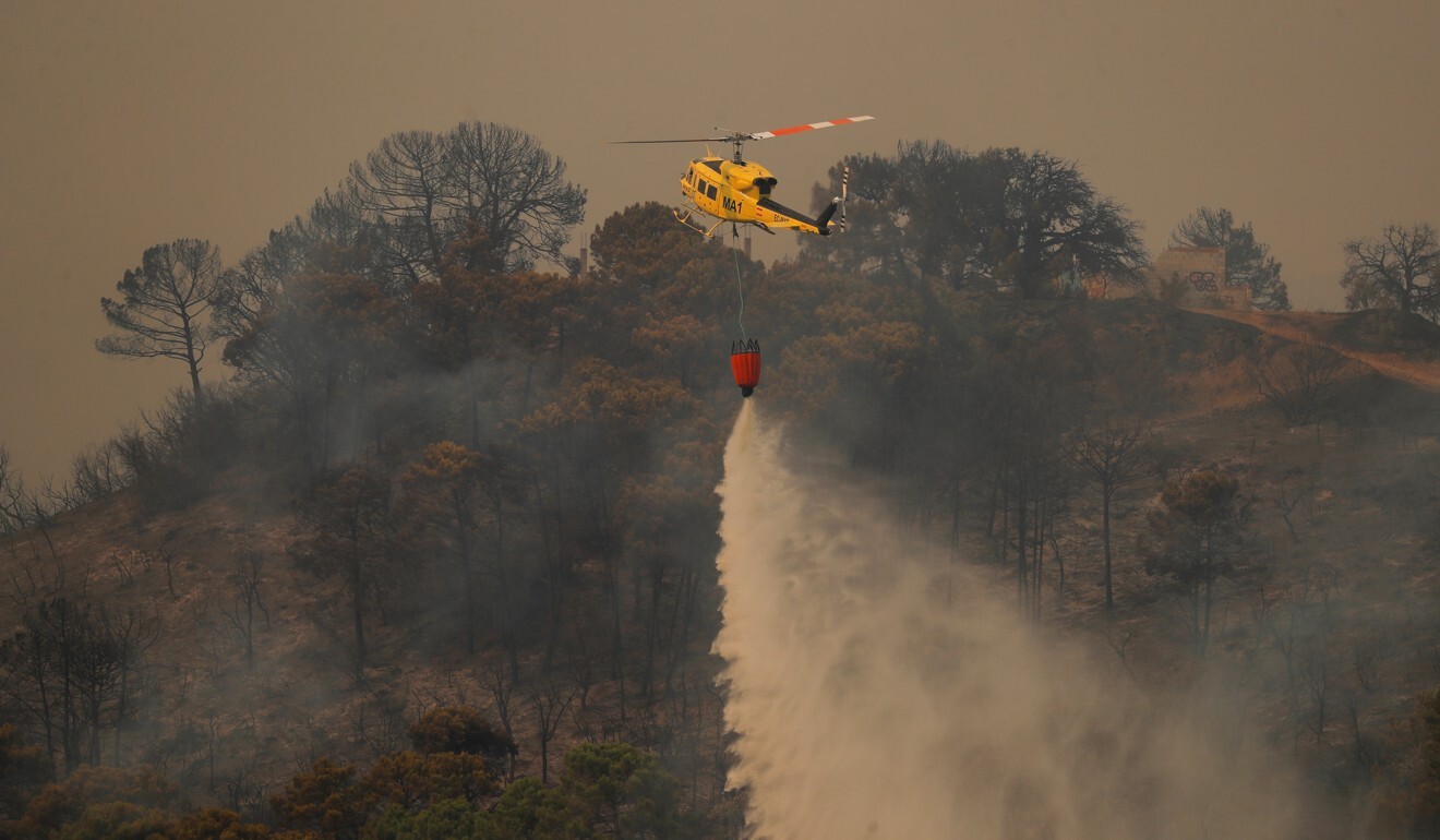 Firefighter dies battling Spain wildfire as more than 900 forced to ...