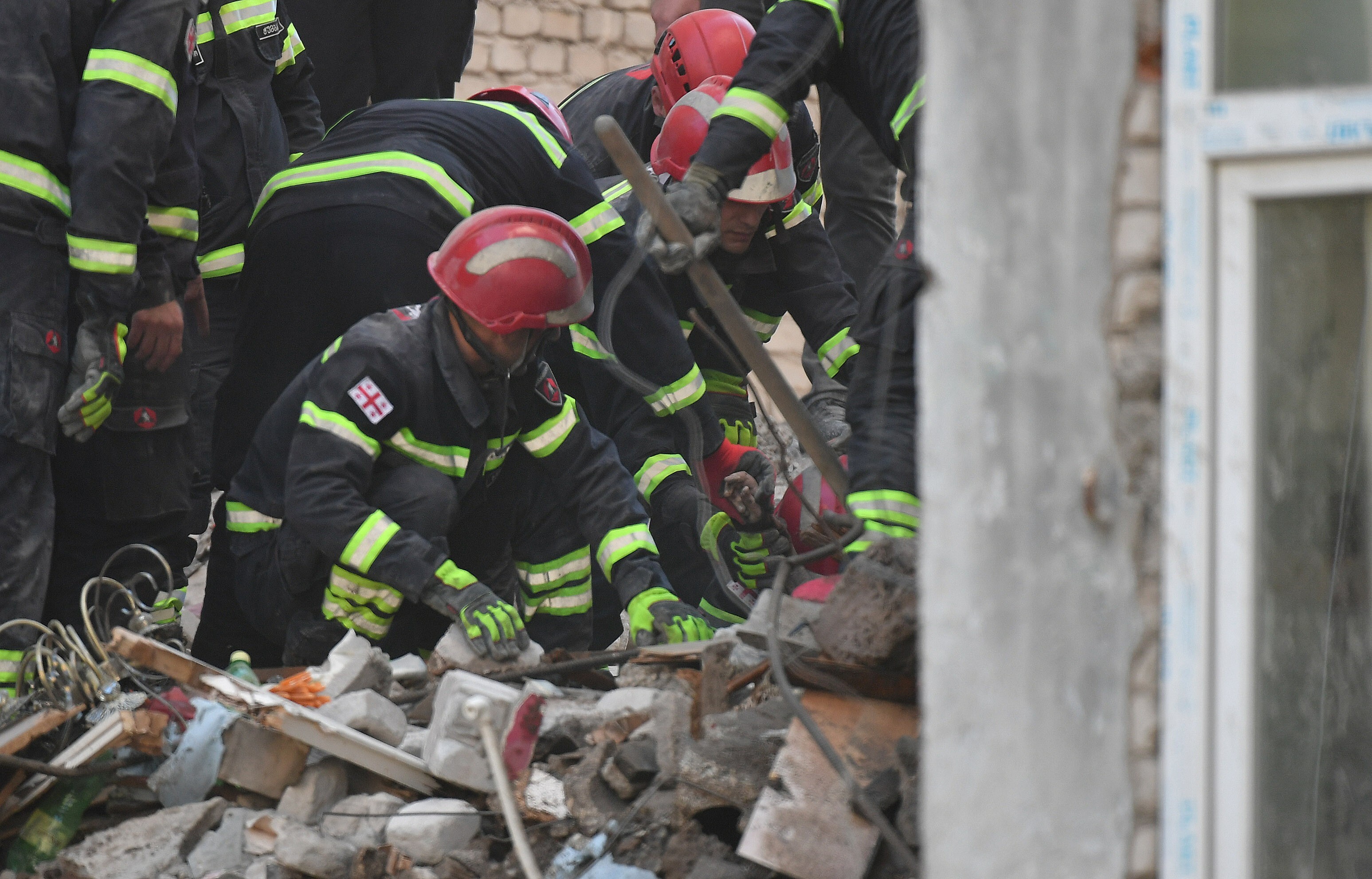 Nine confirmed dead, one man rescued a day after building collapses in ...