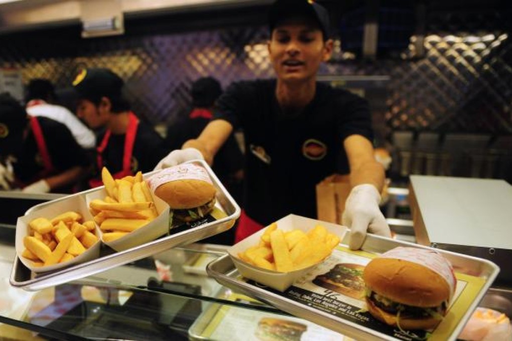 Hunger for Western food and fashion grows in Pakistan | South China ...