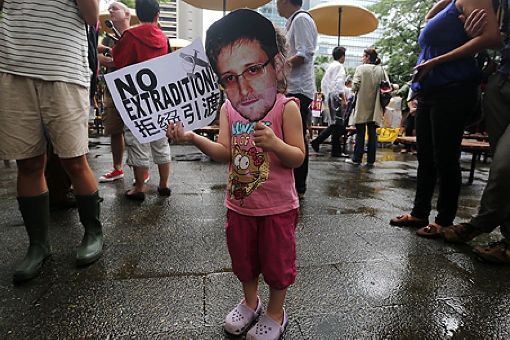 Protesters urge Hong Kong to protect Snowden, demand answers on US ...