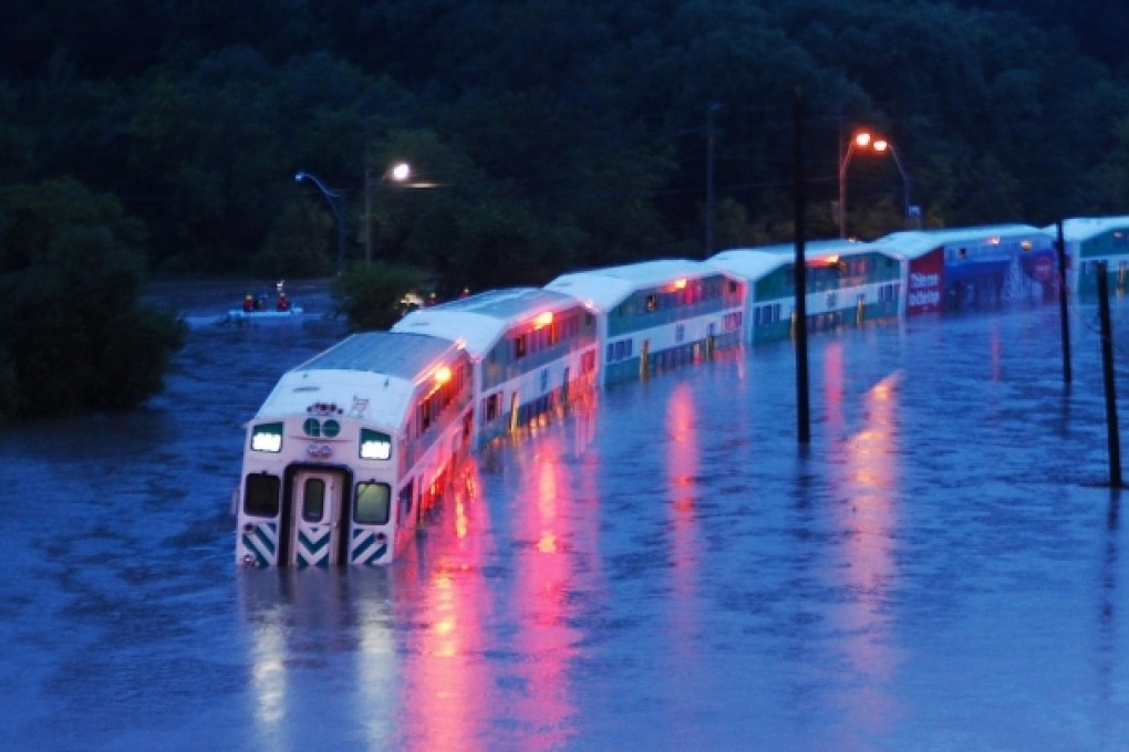 Travel chaos as thunderstorm triggers flash floods in Toronto | South ...