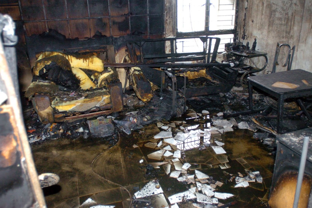 Woman, 38, critical after suspected arson attack at home | South China ...