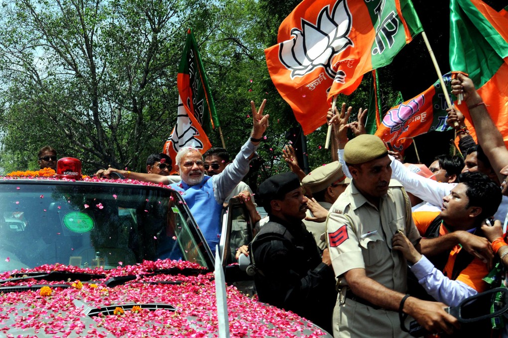 BJP's victorious Narendra Modi makes triumphal entry to New Delhi ...