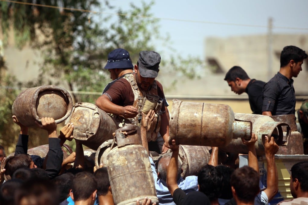 Iraqi forces fight back as UN agrees to investigate atrocities | South ...