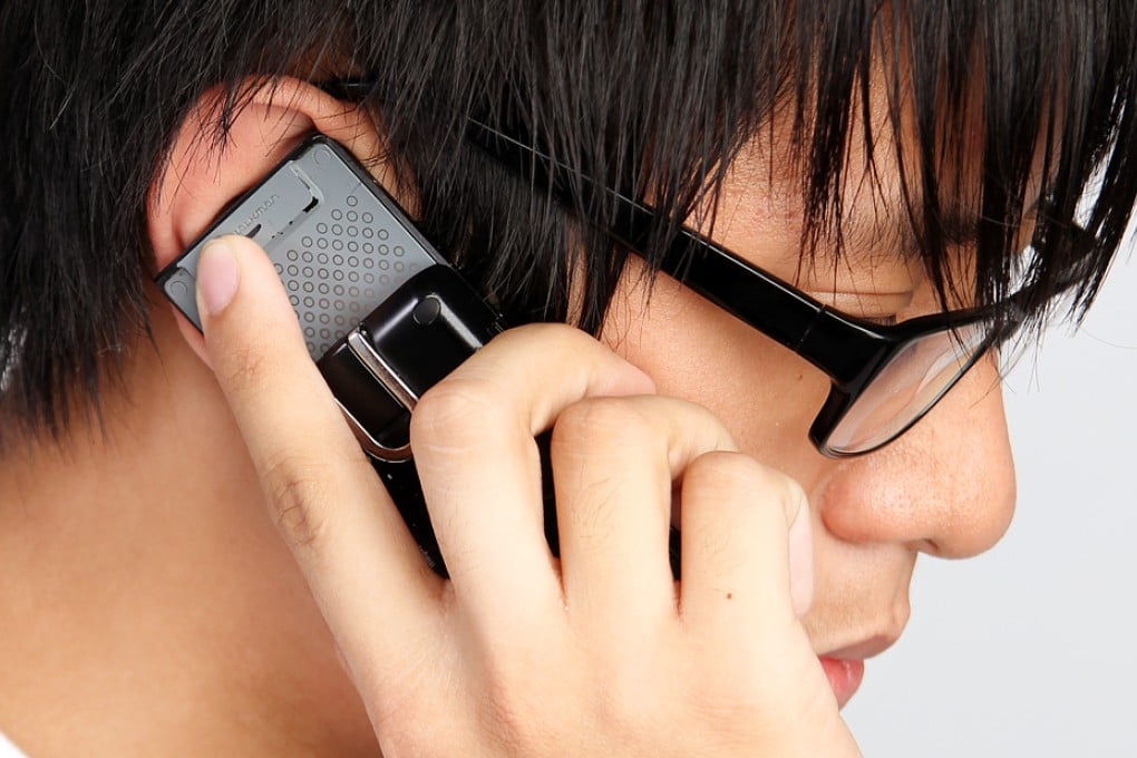 Prank caller who used two phones to make Hong Kong police speak to each ...