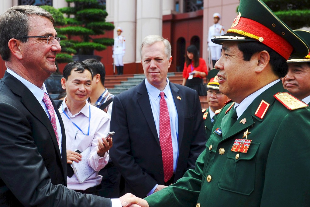 Carter raises threat of island-building in South China Sea during ...