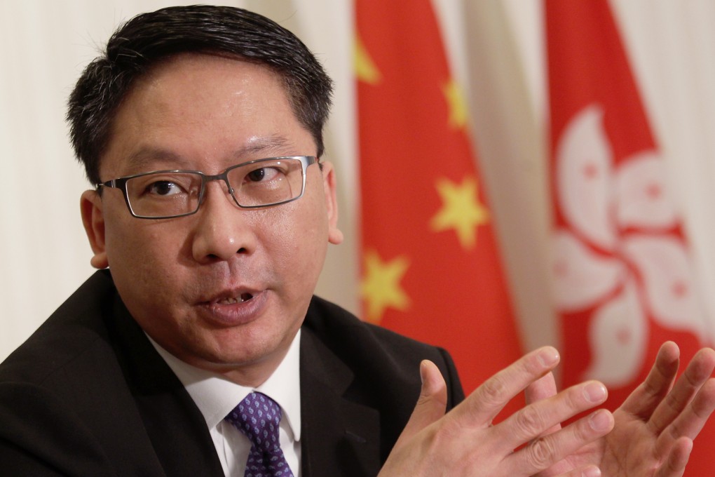Hong Kong justice chief Rimsky Yuen challenges pan-democrats on ...