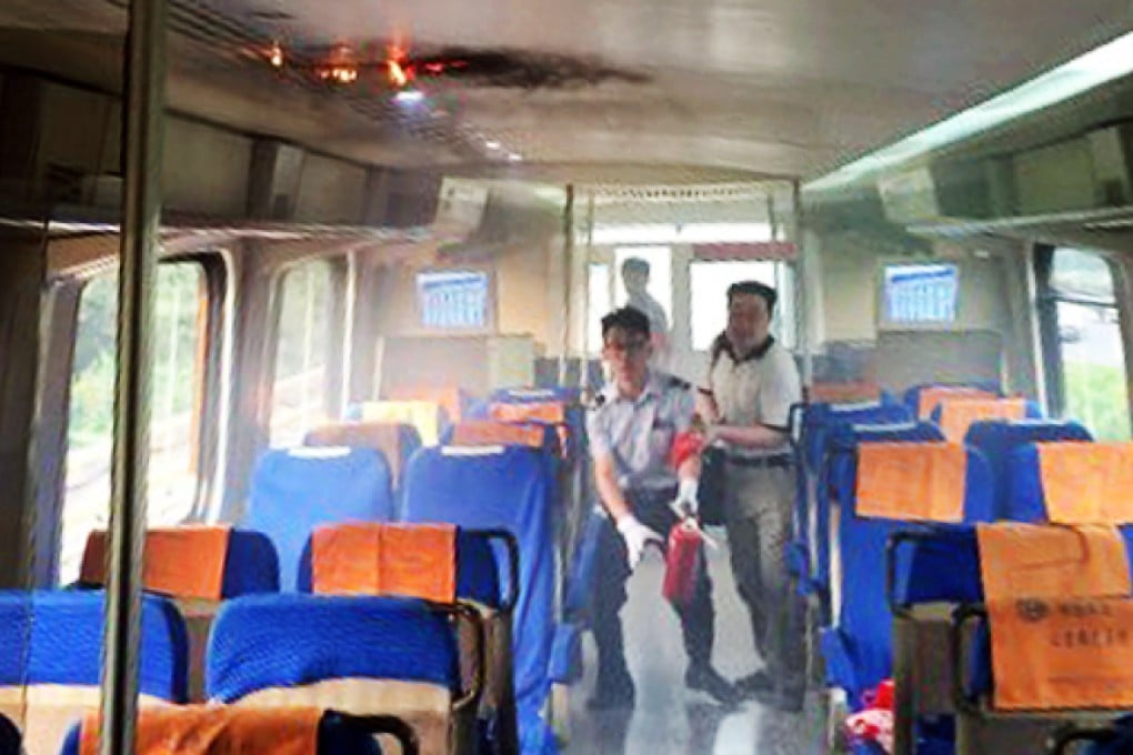 More than 155 train passengers evacuated after fire breaks out on ...