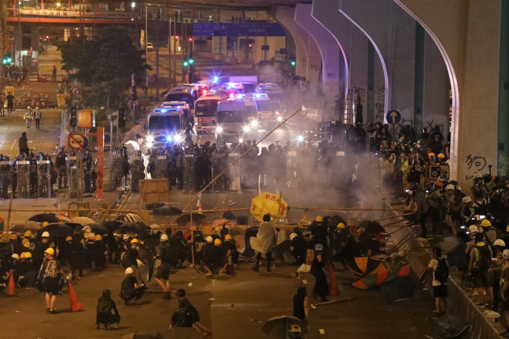 Hong Kong protests: 13 jailed for up to 4 years for rioting near ...