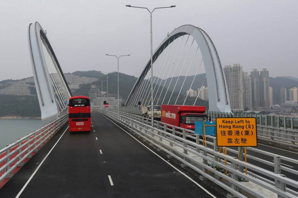 Traffic zips along new Hong Kong bridge, but what happens after ...