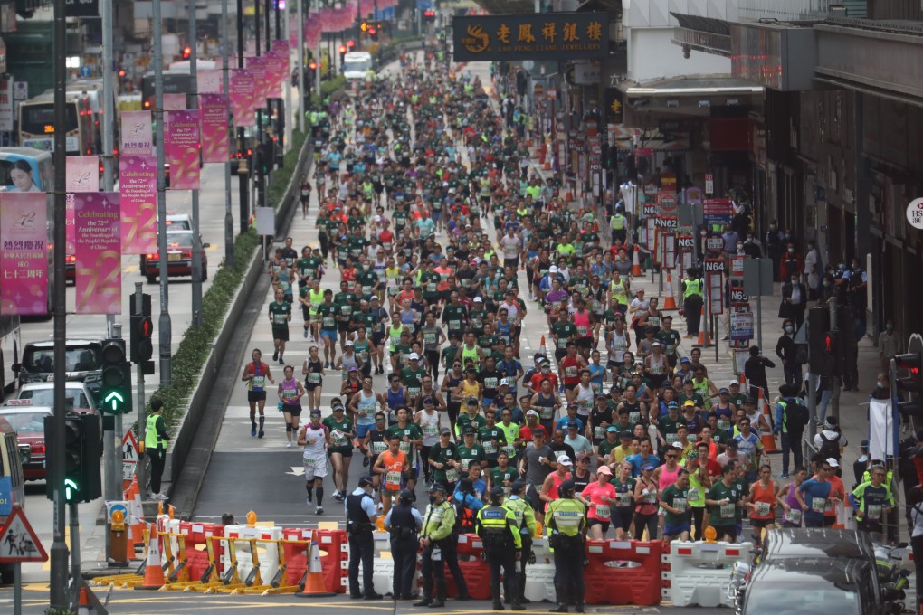 Hong Kong Marathon organisers urge runners not to ‘risk their lives’ in ...