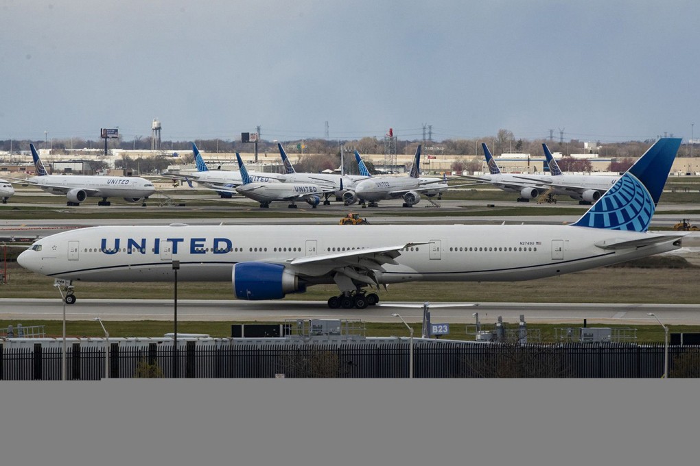 United Airlines flight’s evacuation slide falls into backyard of home ...