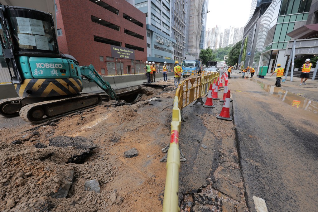 Flooding, road subsidence from burst water pipe disrupt traffic in Hong ...