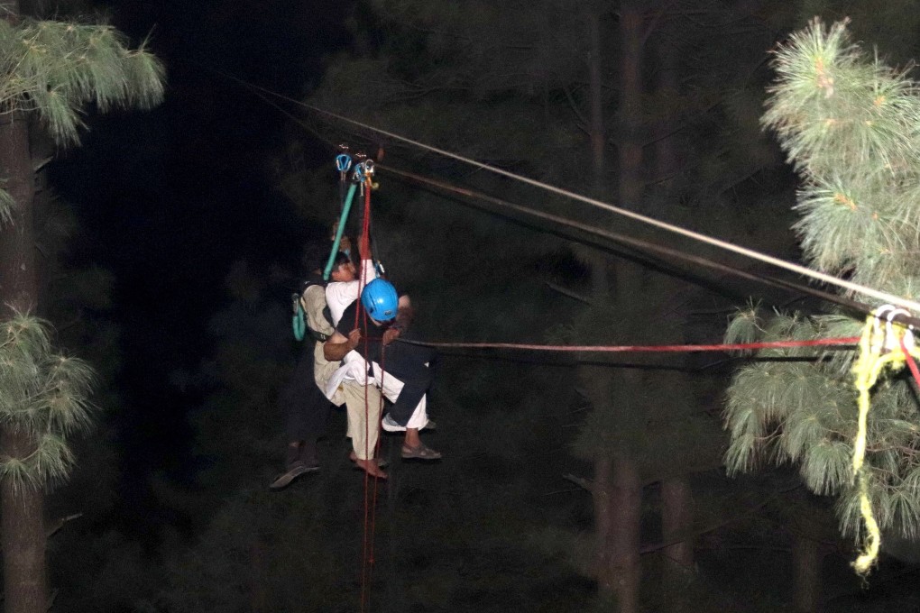 All 7 children rescued from cable car dangling hundreds of metres over ...