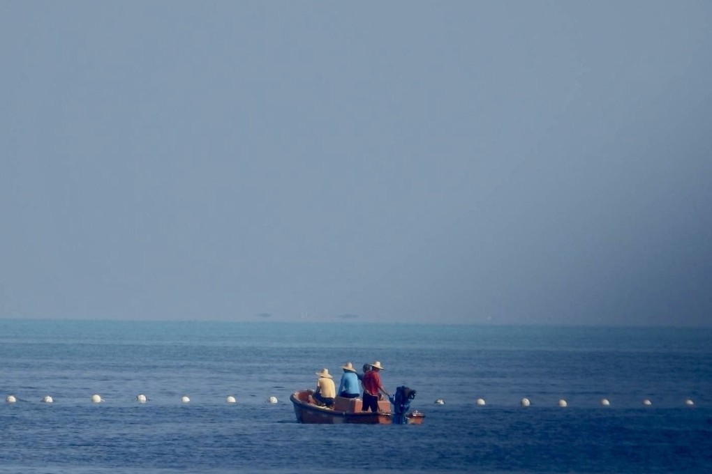 South China Sea: US says Philippines removing Chinese barrier from ...