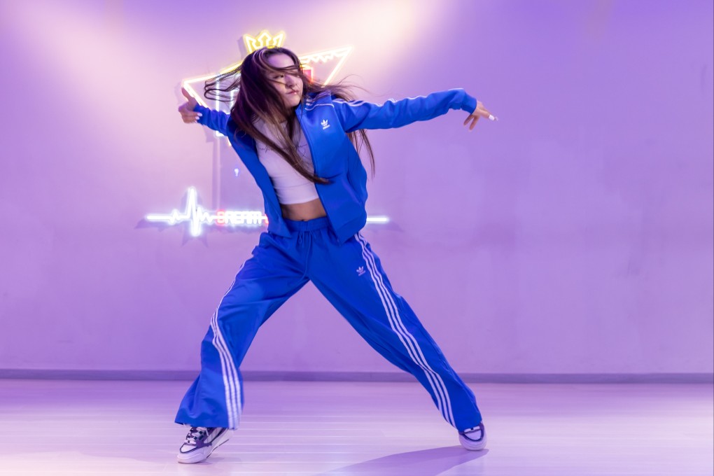 Hongkonger Danie Chan teaches dancing to young artists as she goes ...