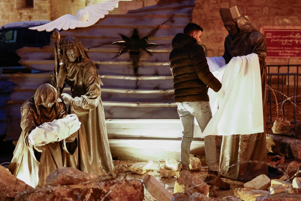 Sombre Bethlehem marks Christmas with vigil as Israeli bombs rain on ...