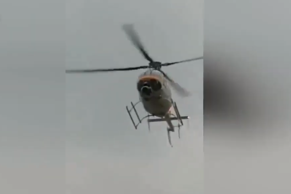 Viral video captures low-flying helicopter disrupting marathon and ...