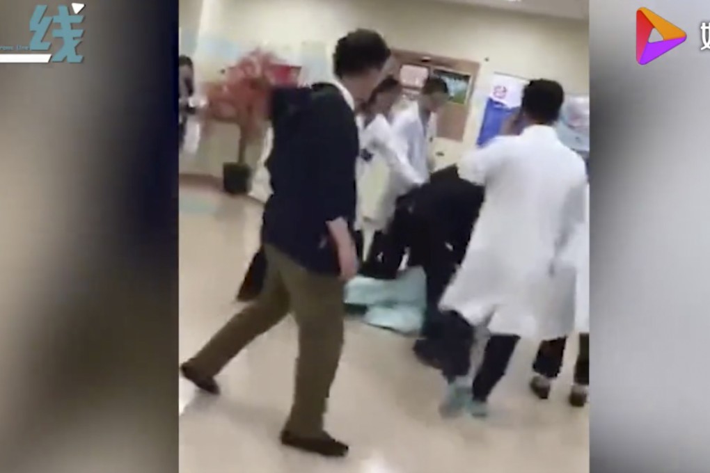 Chinese doctor dragged away in handcuffs after fight with patient’s ...