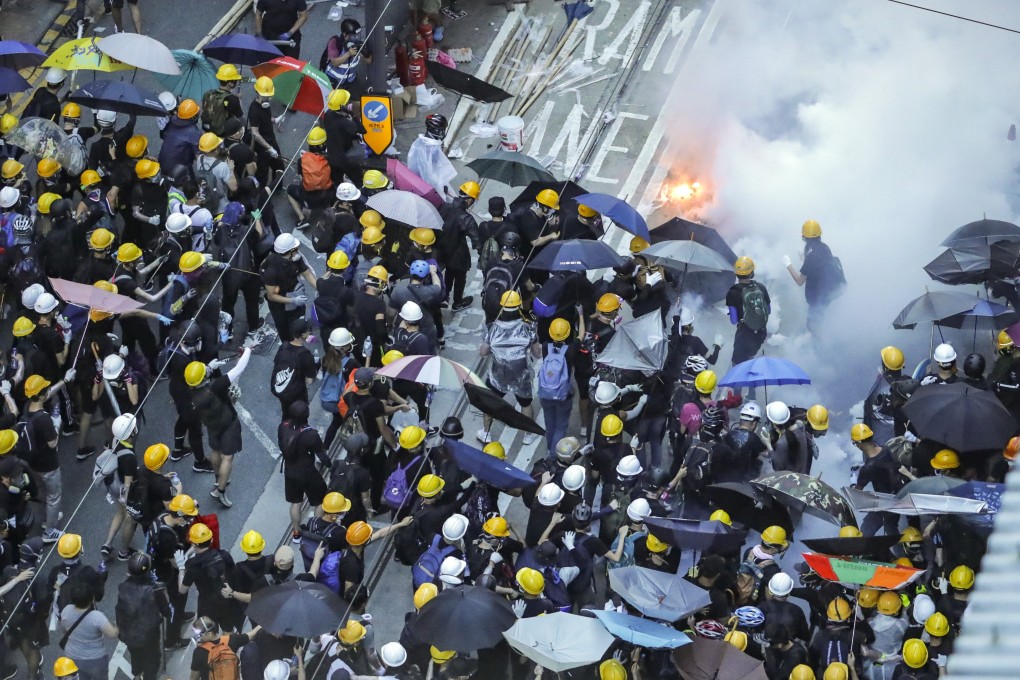 Hong Kong riot charges pushed ahead in unprecedented hardline move as ...