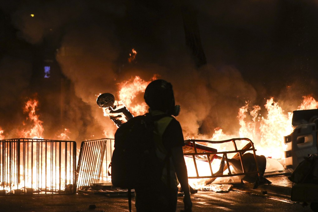 Hong Kong burns in night of violent protest with live rounds shot ...