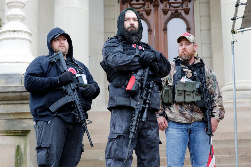 Armed militia at US virus protests a constitutional right, supporters ...