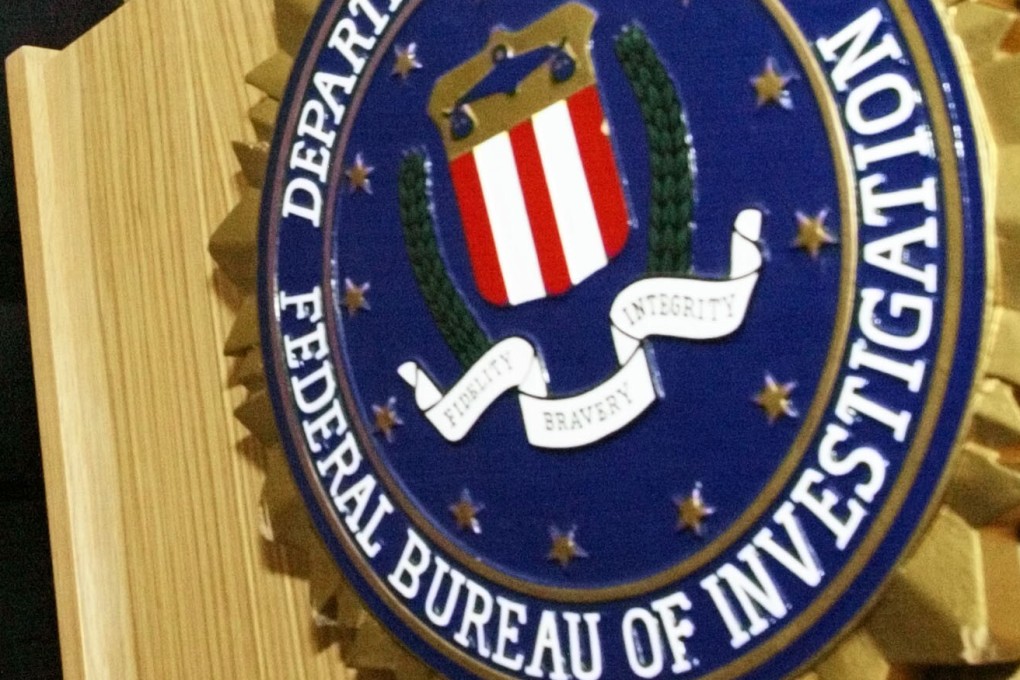 US arrests Chinese-born researcher Qing Wang over ties to Thousand ...