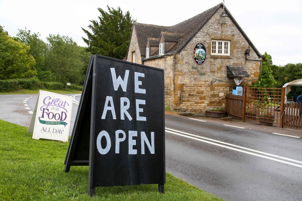 Beer flows again as England’s pubs reopen after coronavirus lockdown ...