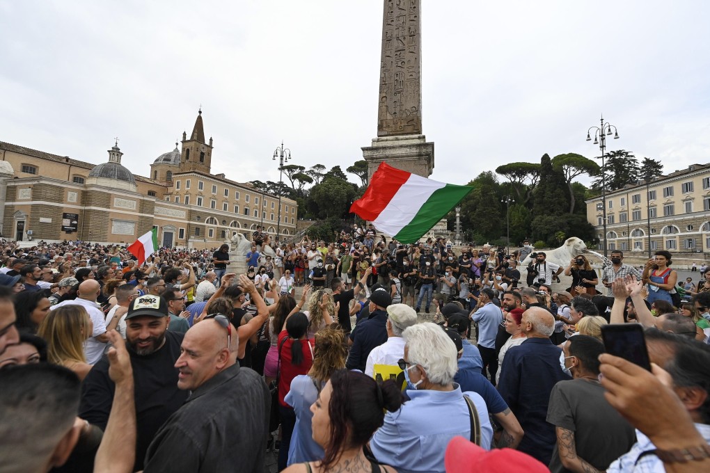 Thousands in Italy protest against tougher regulations to contain ...