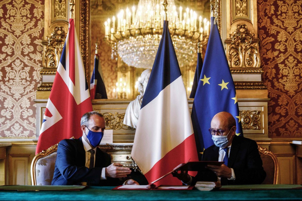 France and Britain sign security deal on fighting Channel terror threat ...