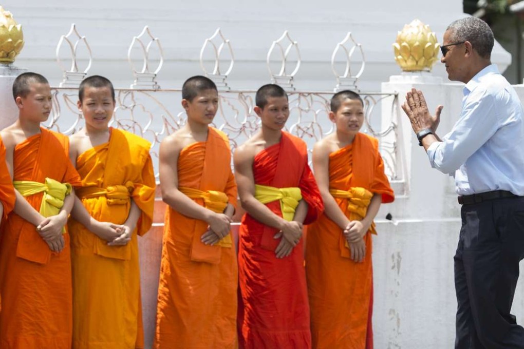 US President Barack Obama embraces Laotian culture and pushes back ...