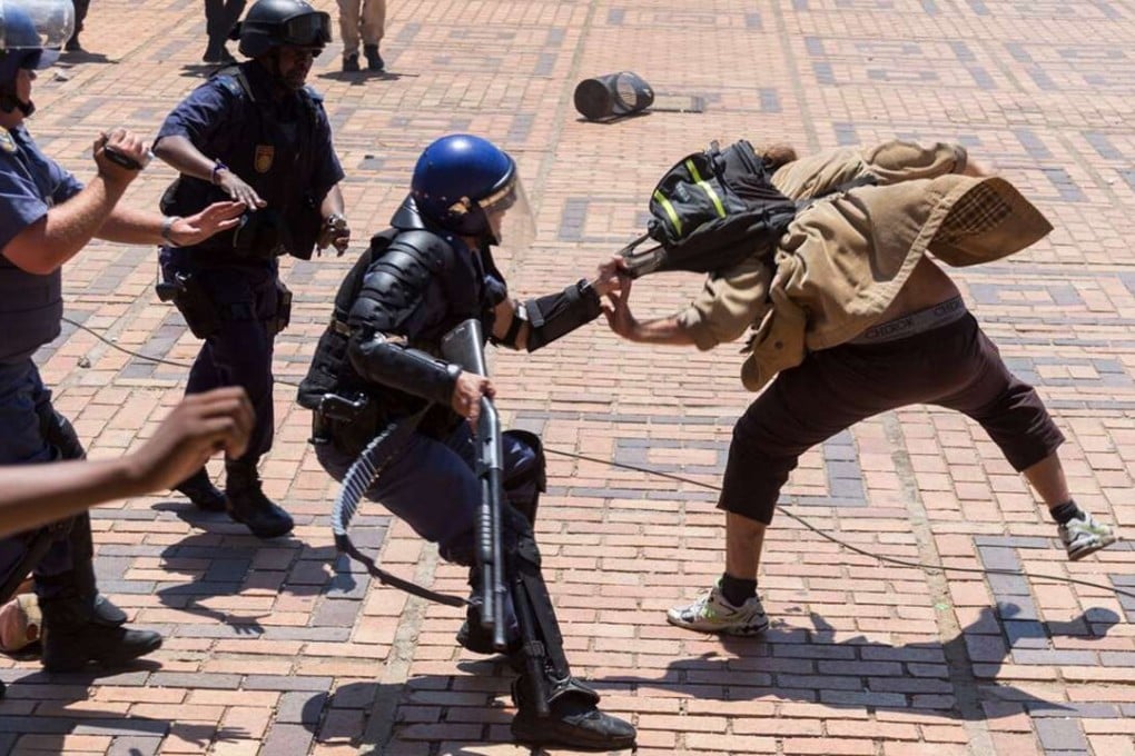 Shadow of apartheid looms over free-education protests in South Africa ...