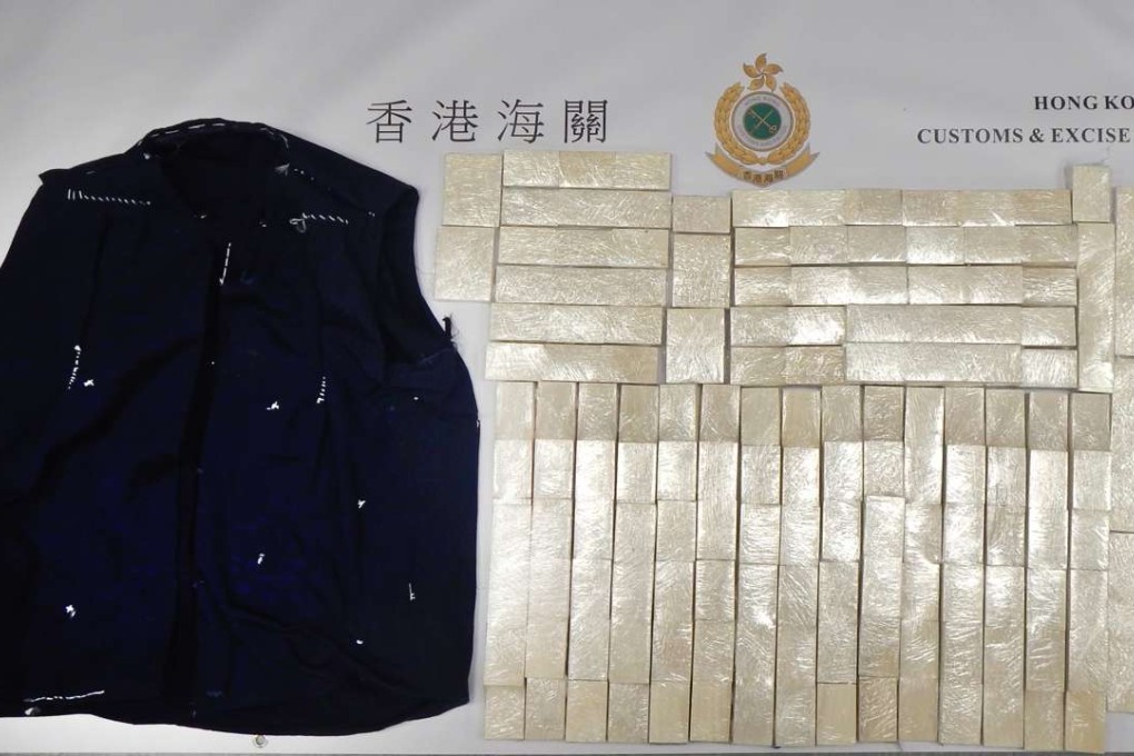 Man arrested with HK$514,000 in worked ivory at Hong Kong International ...