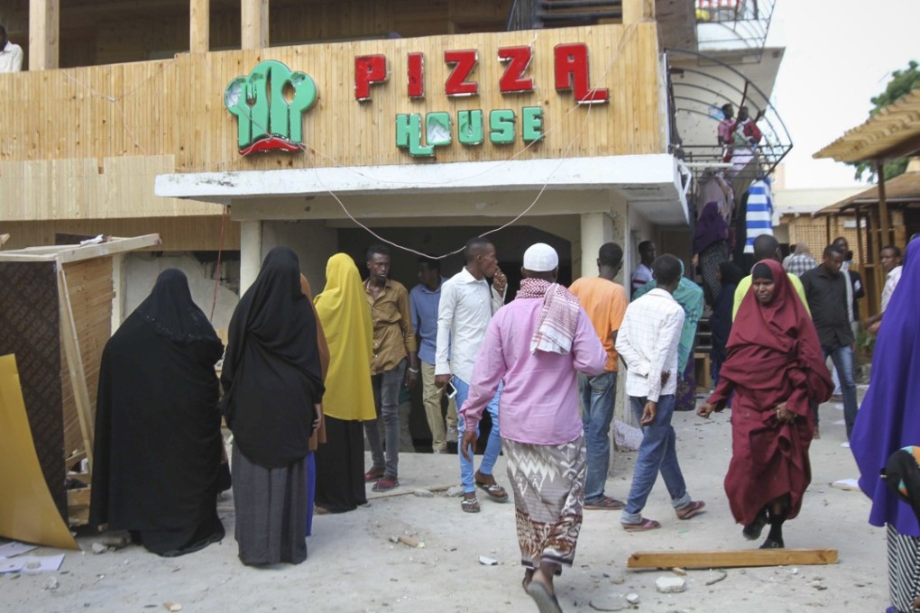 Somali gunmen kill 17, take hostages at popular restaurant | South ...
