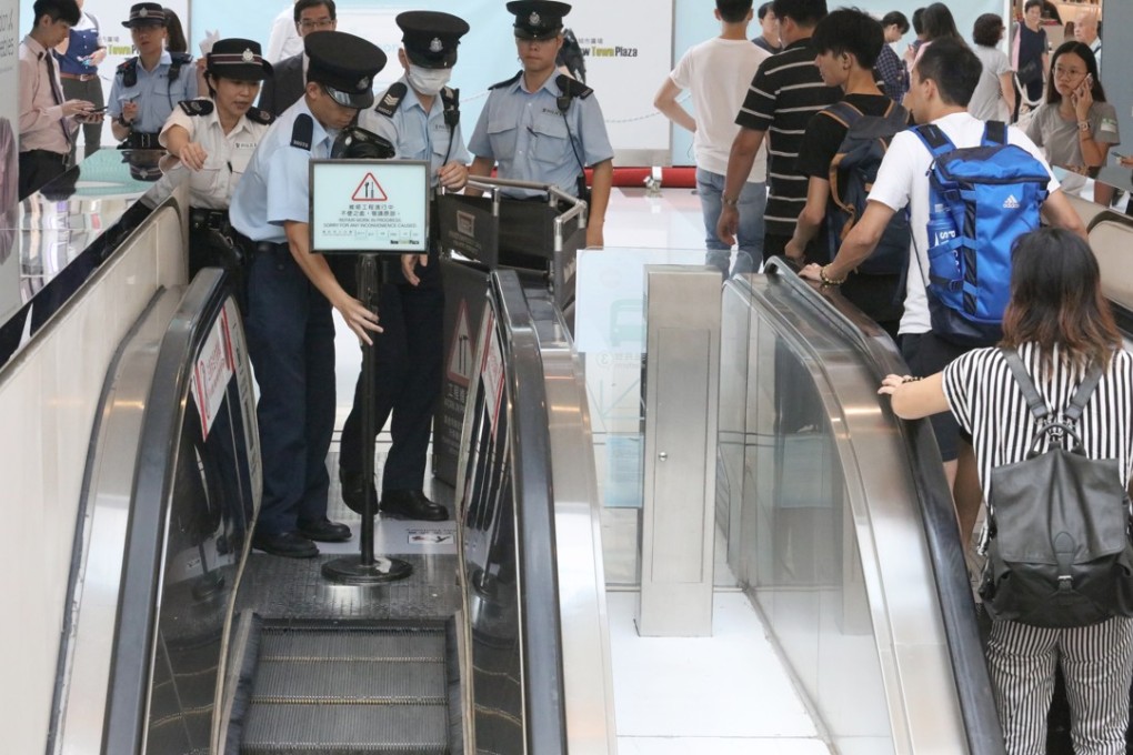 Woman, 69, dies after collapsing on escalator in Hong Kong shopping ...