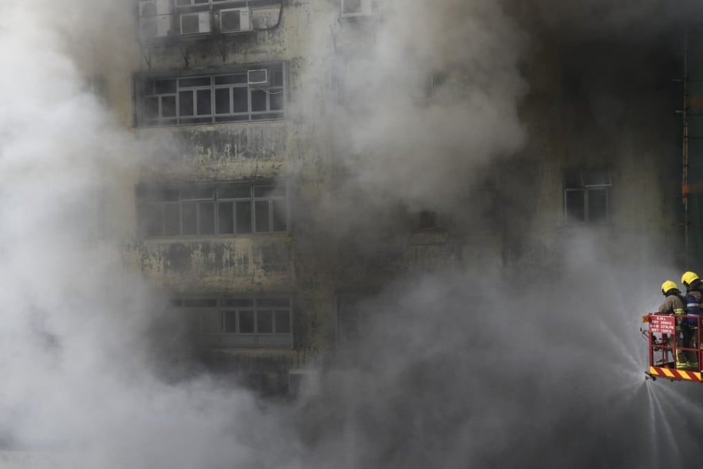 Hong Kong industrial building fire sends woman to hospital, triggers ...