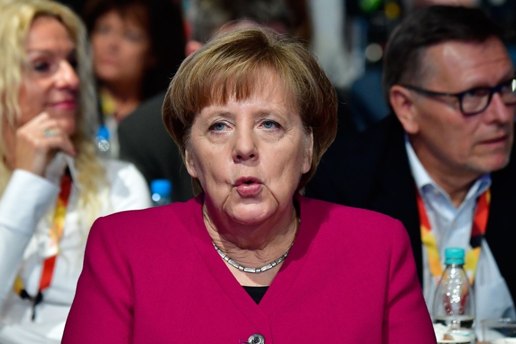Merkel’s party finally backs new coalition government deal | South ...