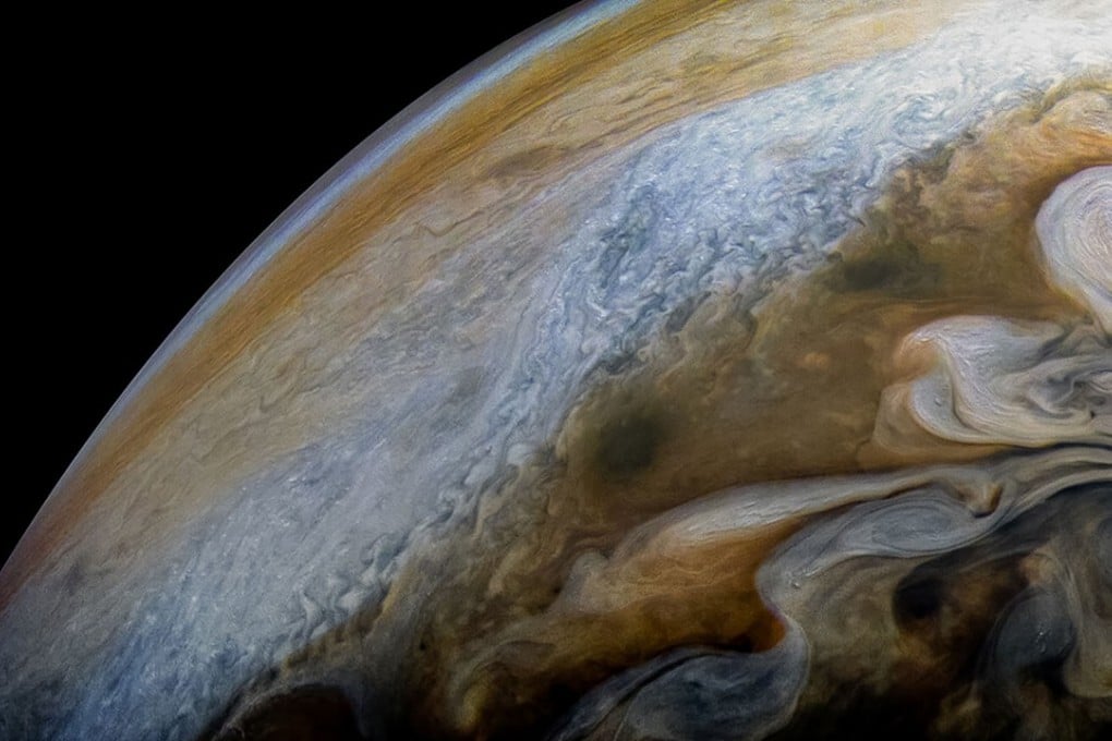 What lies beneath: Nasa’s Juno spacecraft gazes deep inside Jupiter’s ...