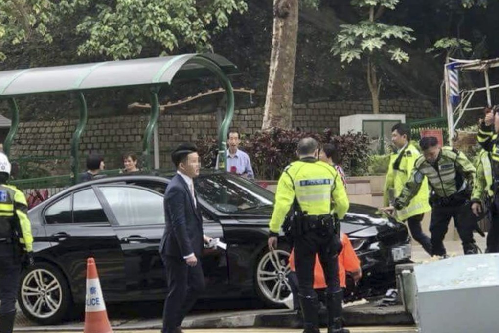 Mother waiting to cross Hong Kong street loses foot after car mounts ...