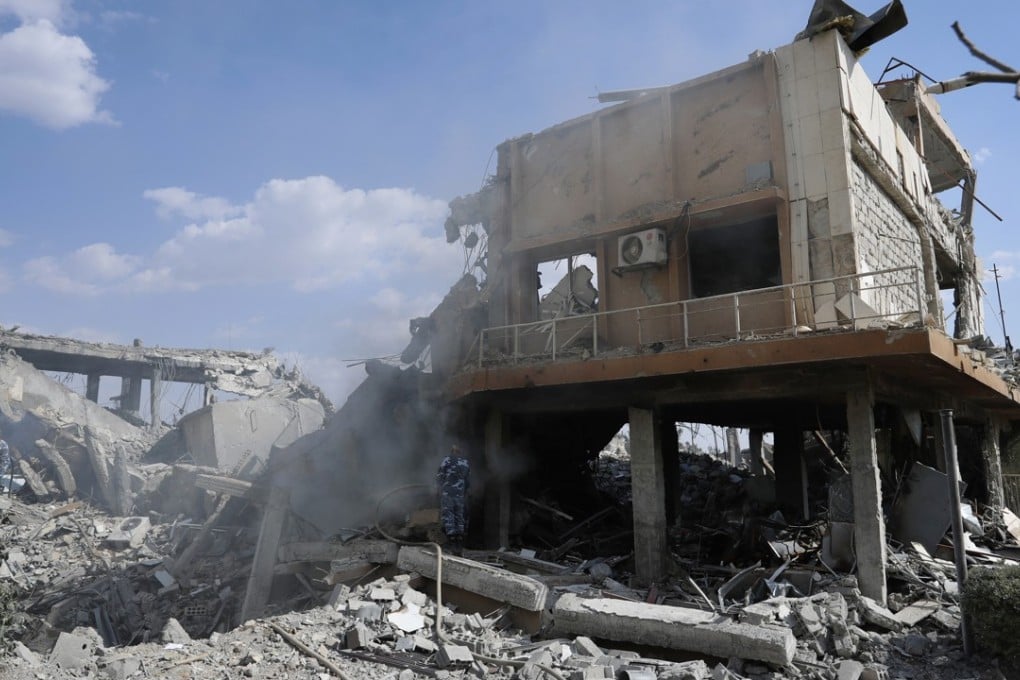 Workers at Syria lab destroyed by missiles deny producing chemical ...