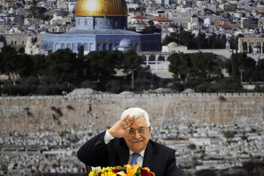 Palestinian leader Abbas is re-elected as chairman of PLO executive ...