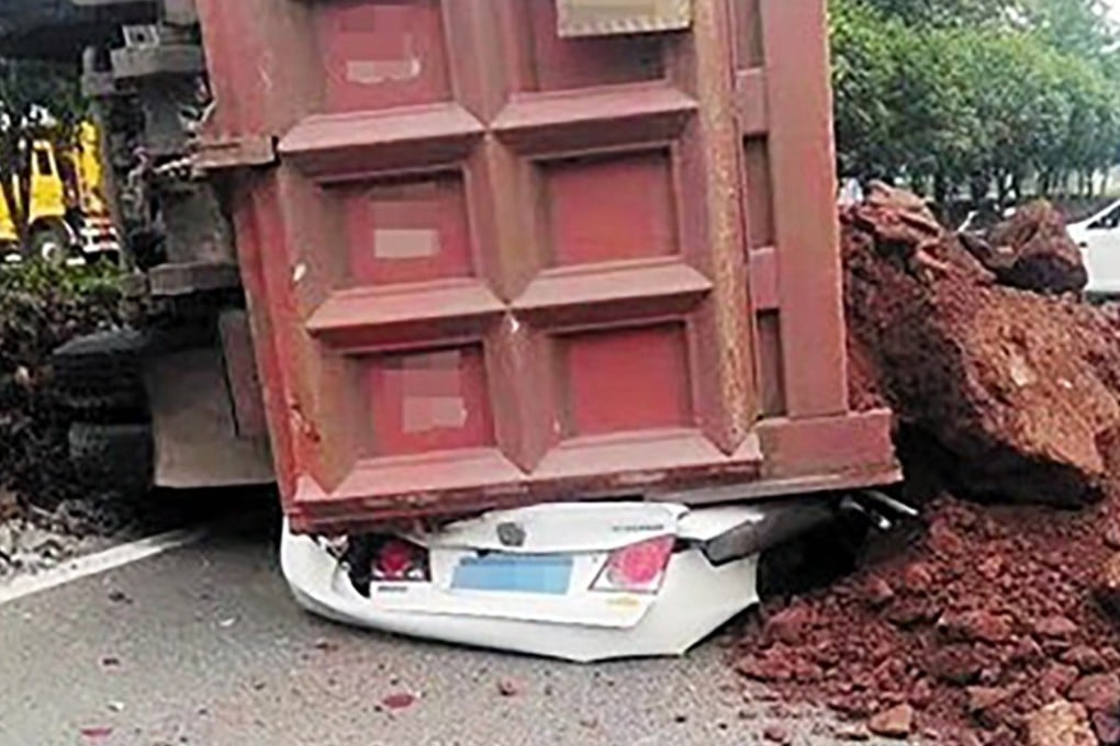 Child saved from wreckage after dump truck flattens car in southeast ...