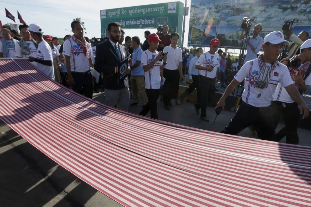 Cambodians set world record for longest handwoven scarf, which took six ...