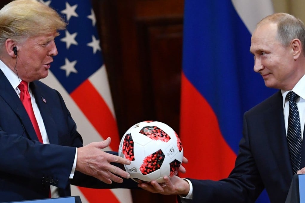 Fifa World Cup: Vladimir Putin gives Donald Trump soccer ball at ...