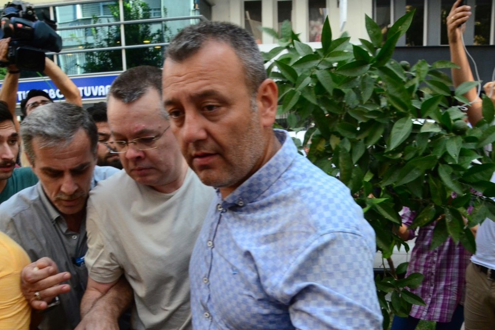 Donald Trump imposes sanctions on top Turkish officials over detention ...